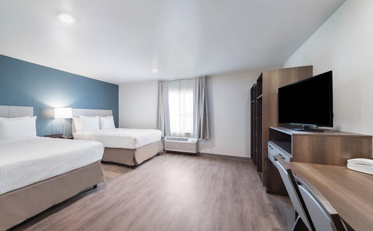 Extended Stay Hotel in Plano, TX | WoodSpring Suites Dallas Plano ...