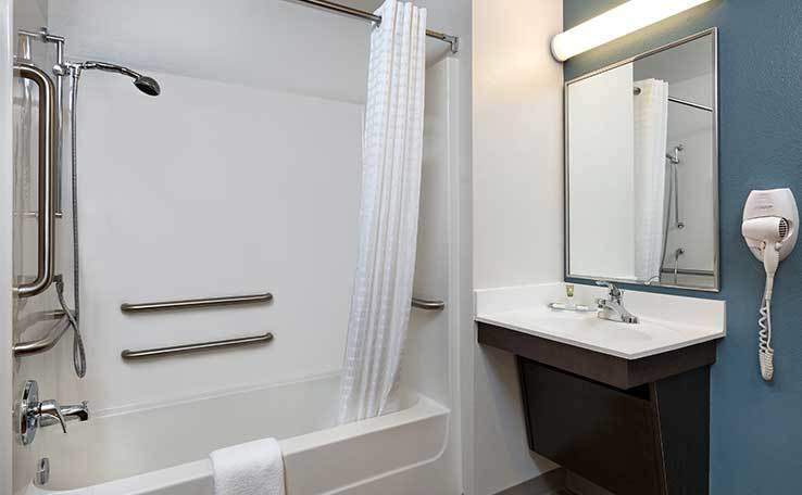 Extended Stay Hotel in Plano, TX | WoodSpring Suites Plano - North Dallas